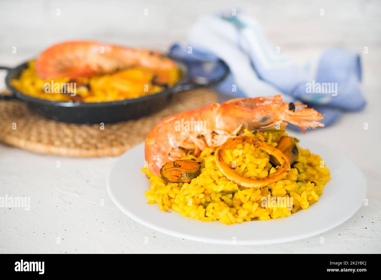 Paella typical spanish food in granite background Stock Photo - Alamy