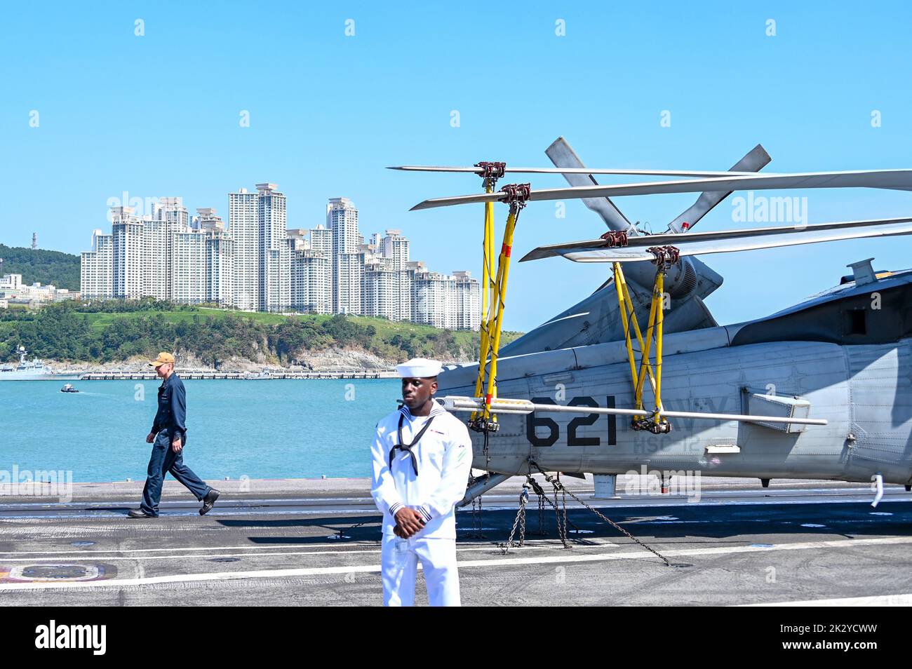 Busan, South Korea. 23rd Sep, 2022. U.S. Navy sailors stand on the deck ...