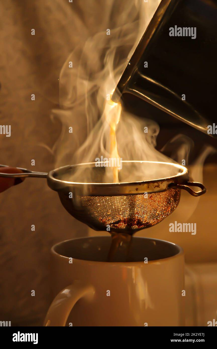 Woman using kettle hi-res stock photography and images - Alamy