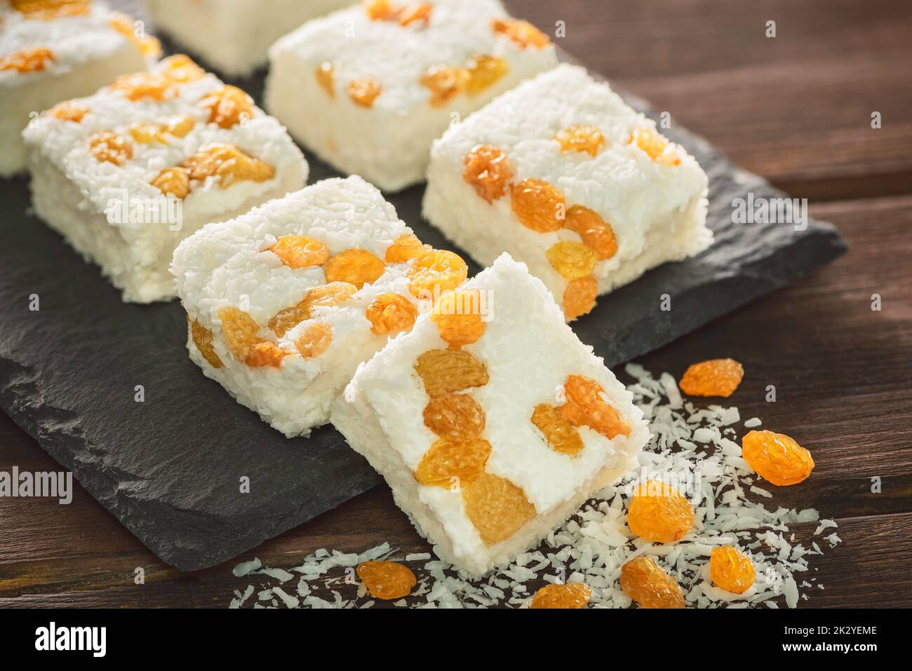 Arabic traditional coconut candies with raisins. Egyptian oriental ...