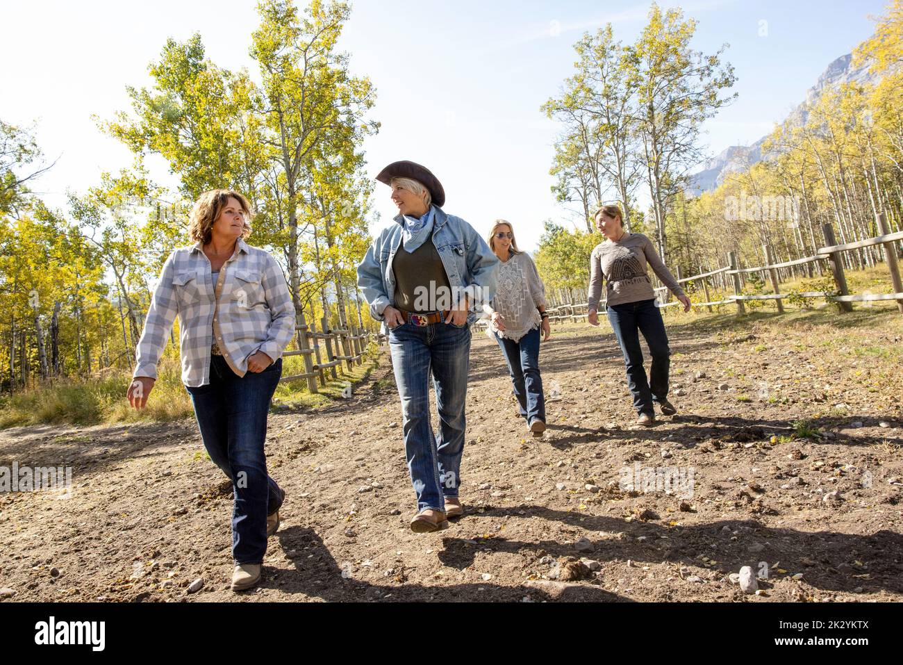 Group mature walking outdoors hi-res stock photography and images - Alamy