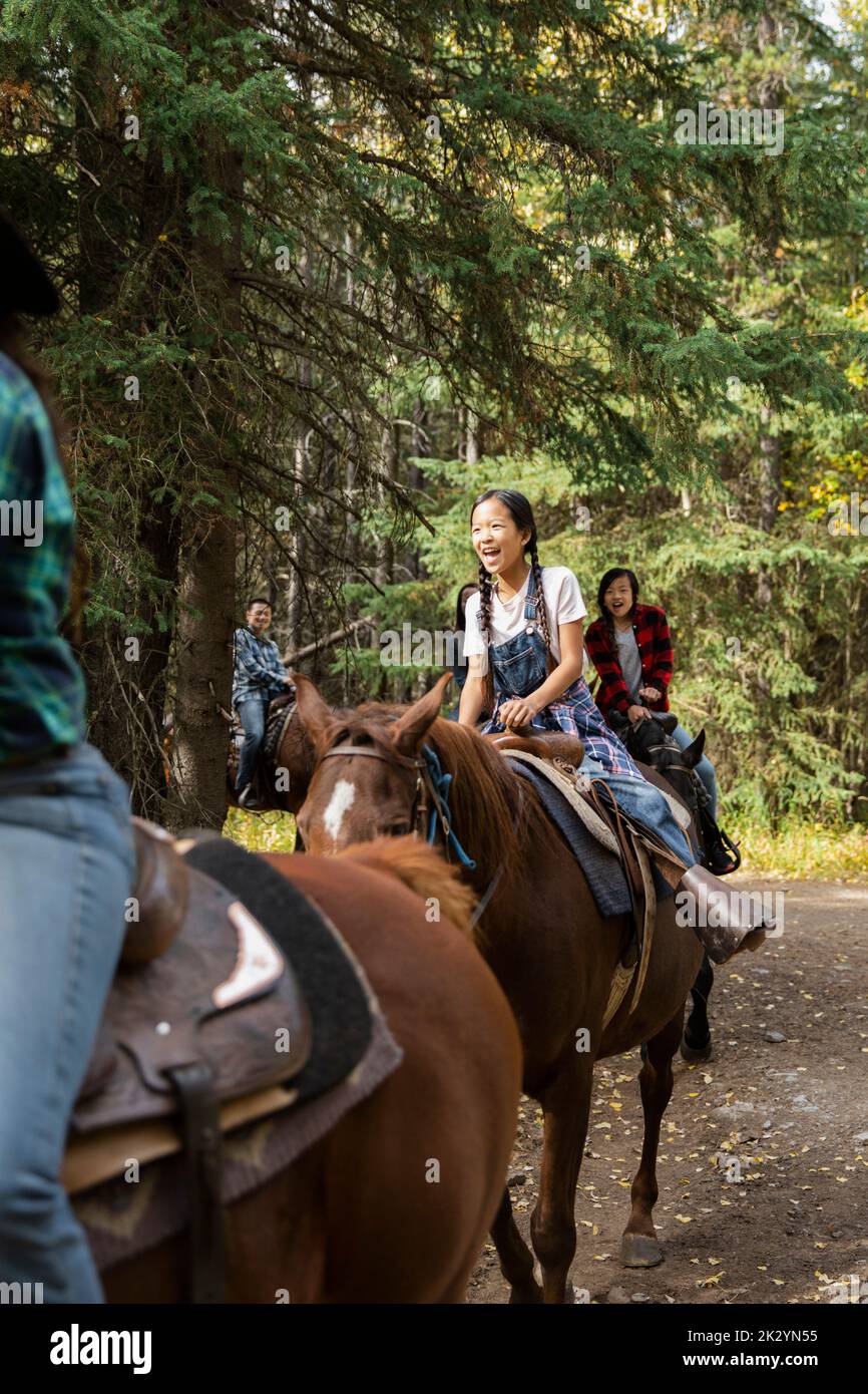 Family horse riding hi-res stock photography and images - Alamy