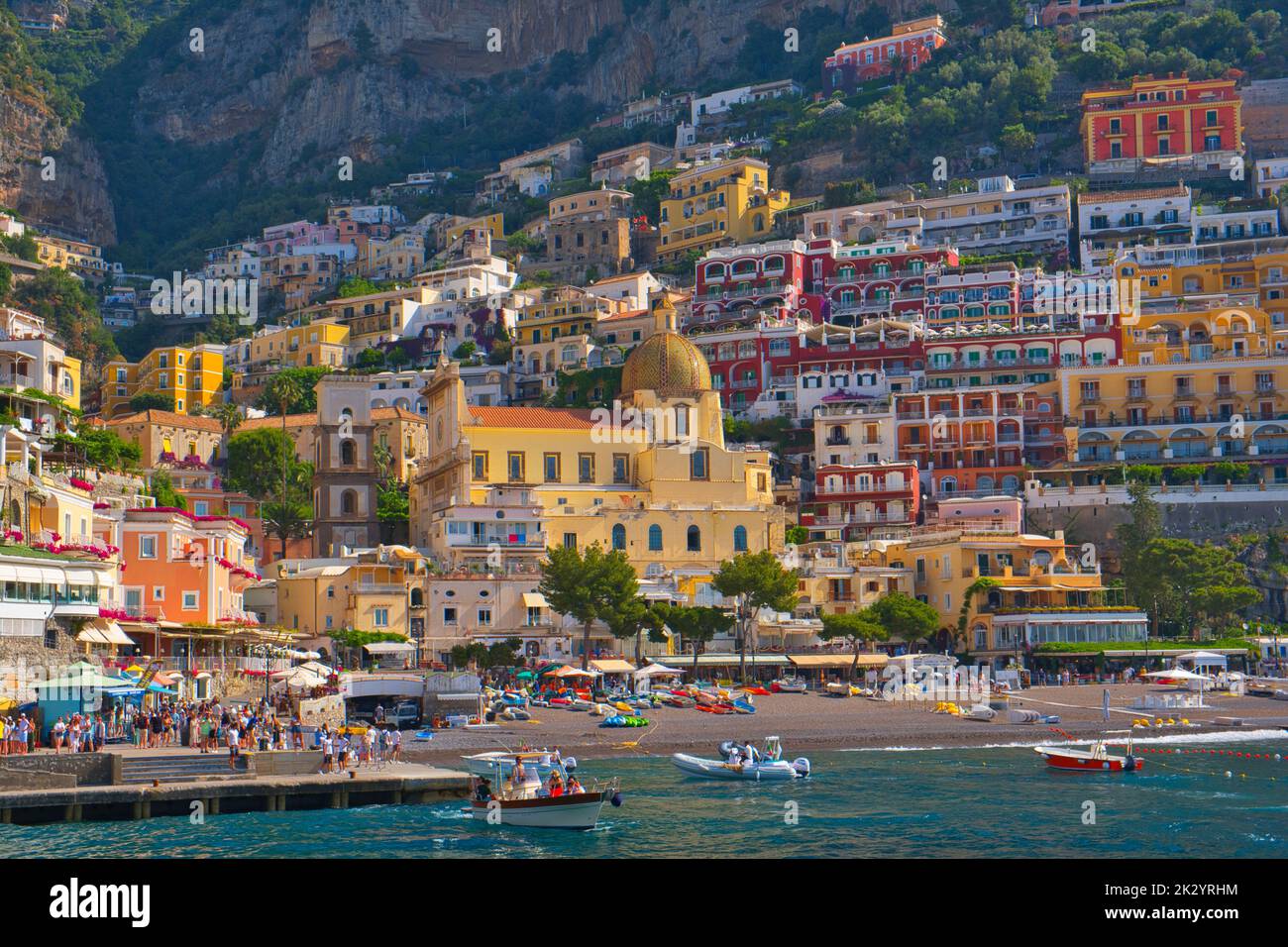 The colorful architecture of the coastal village Positano with a beach ...