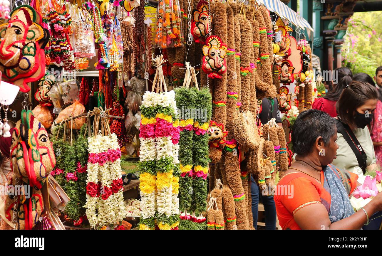 A colorful Indian craft market, temple garlands near a Hindu temple in ...