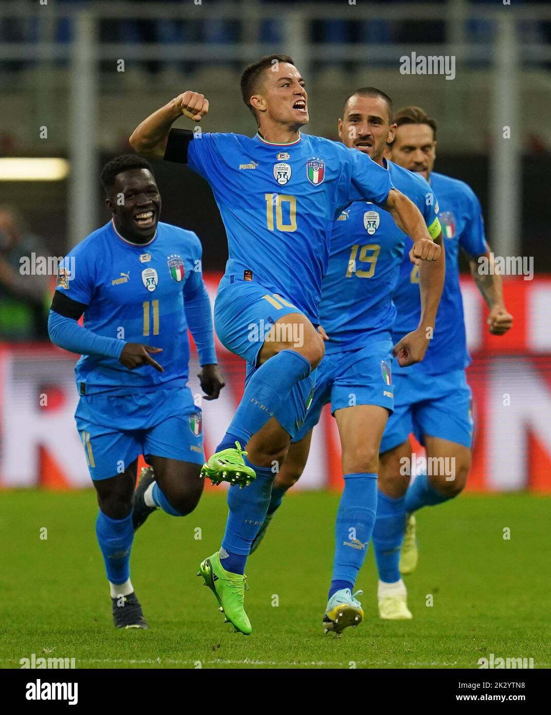 Italy's Giacomo Raspadori celebrates scoring their side's first goal of ...