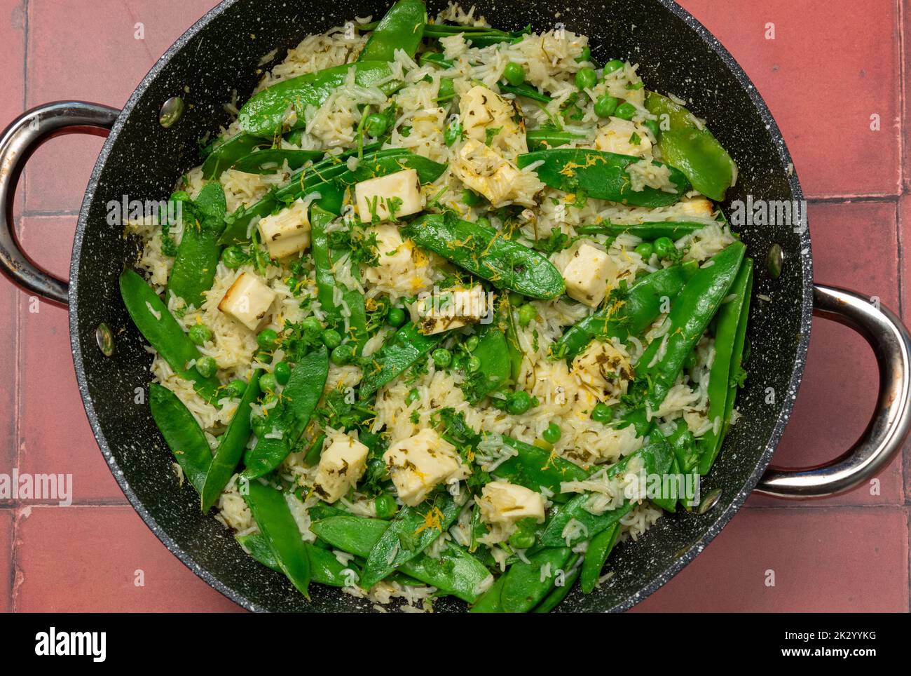 Herby paneer baked rice from above Stock Photo - Alamy
