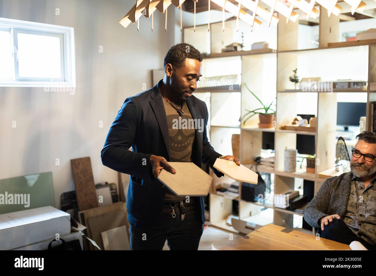 Building working together hi-res stock photography and images - Alamy