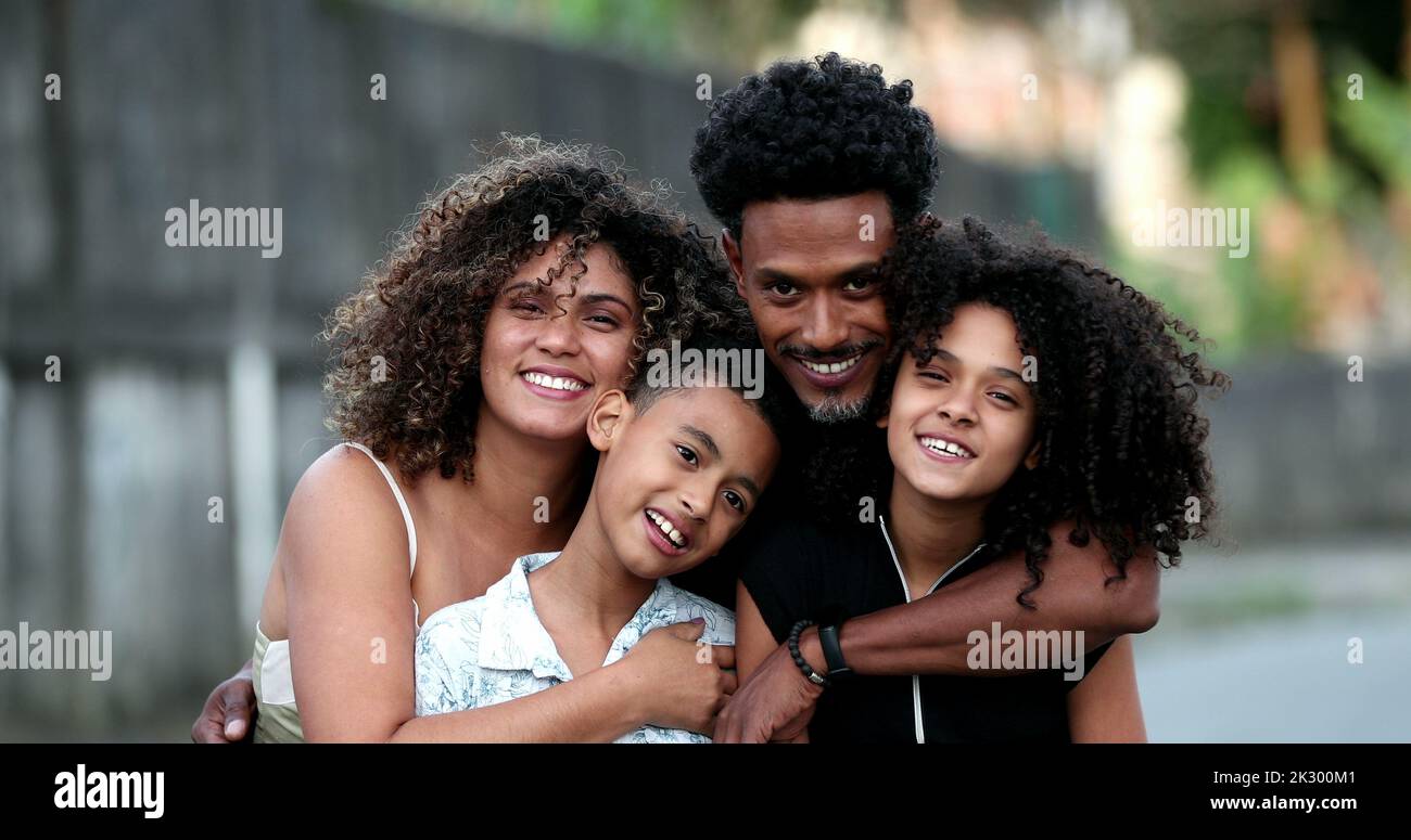 African family portrait standing for photo outside. Smiling black ...