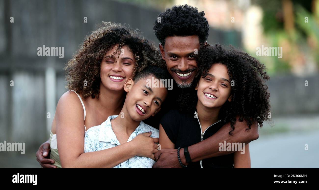 African family portrait standing for photo outside. Smiling black ...