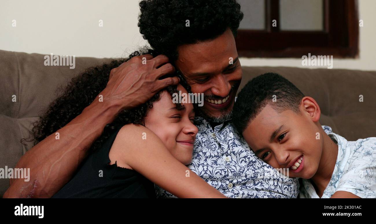 Black father with daughter son family candid love and affection Stock ...