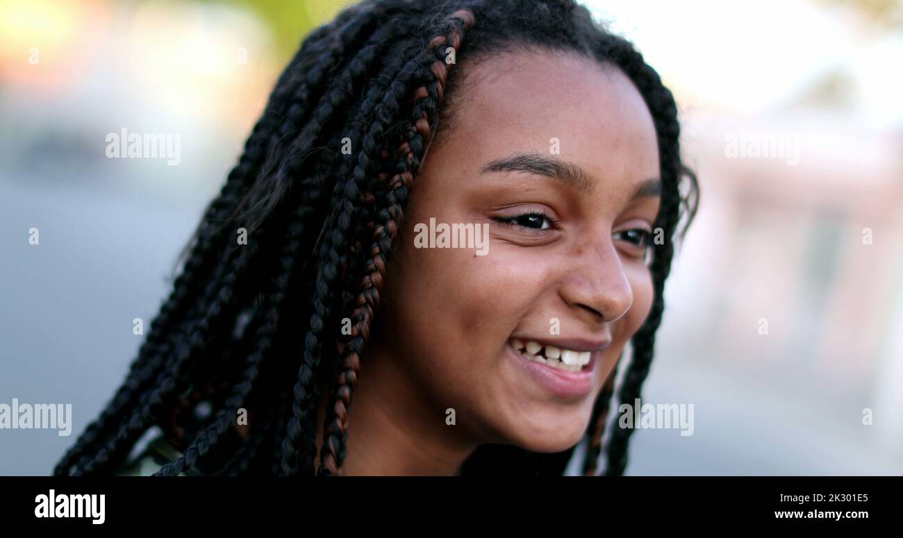 Black girl holding laughter. Real life person laugh and smile Stock ...