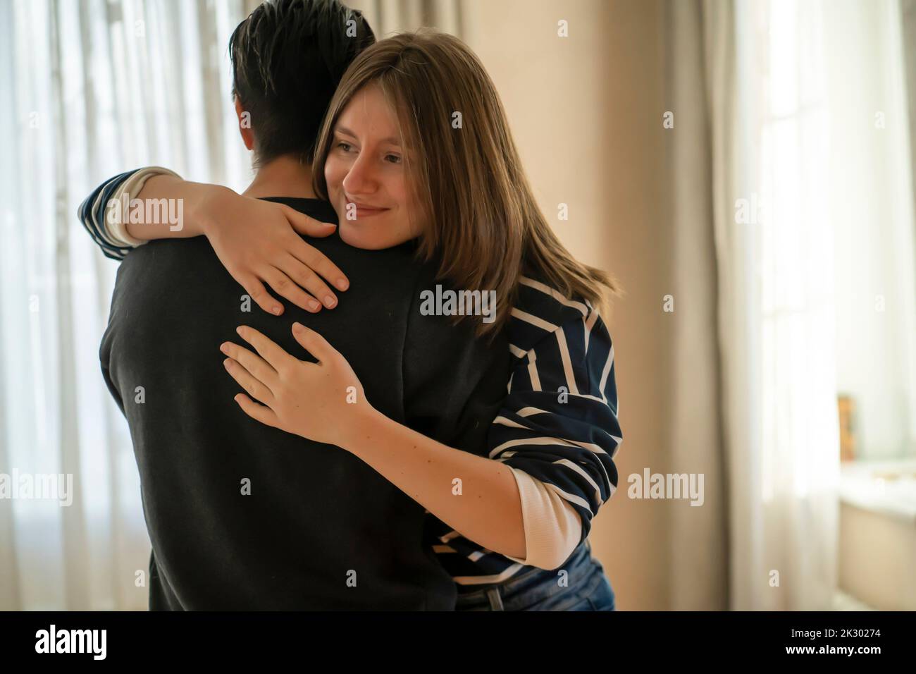 Warm hugs hi-res stock photography and images - Alamy