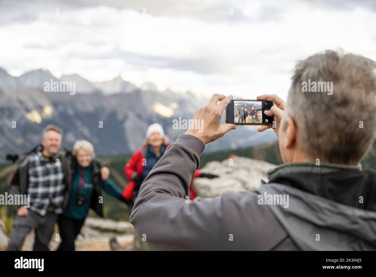 Happy man hiking mountains hi-res stock photography and images - Alamy