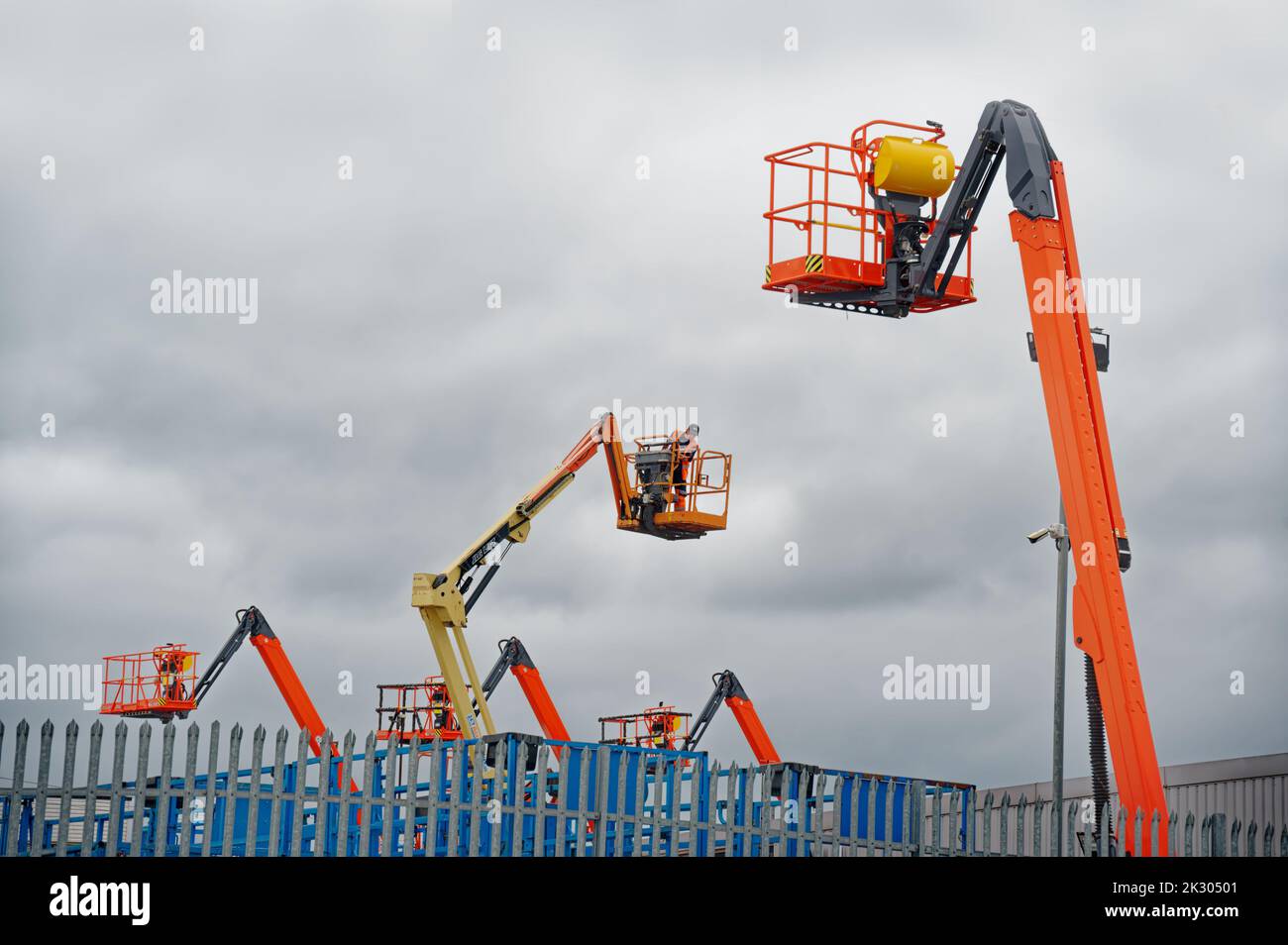 Access platform equipment powered high in sky at construction building ...