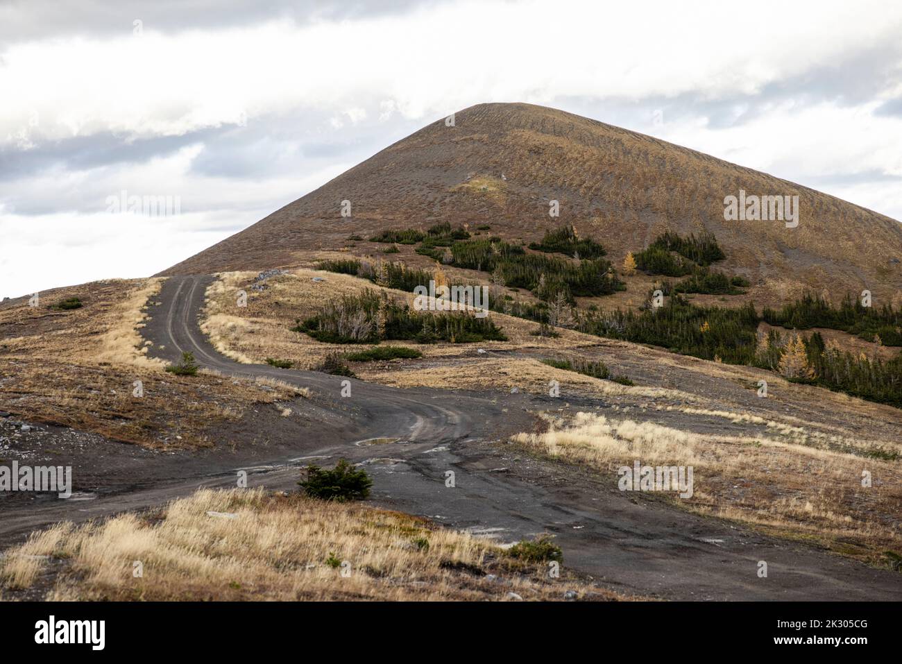 Remote dirt road on mountain slope hi-res stock photography and images ...