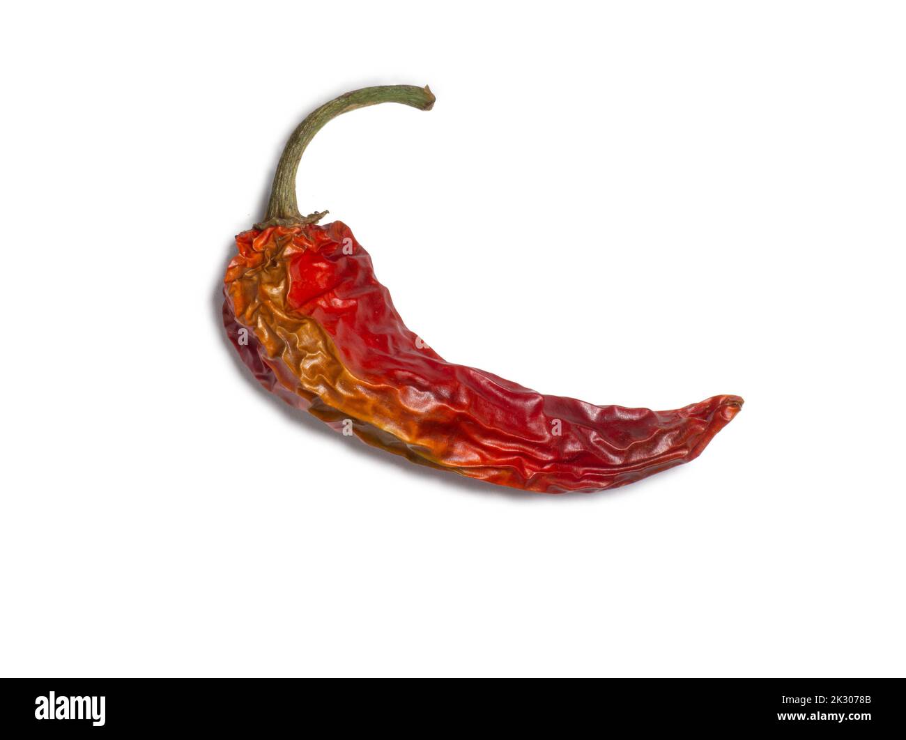 Dried red pepper on a white background. Ingredient for dishes. Spice ...