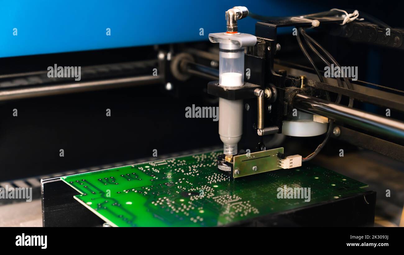Indoor shot of the main elements of soldering paste dispenser machine ...
