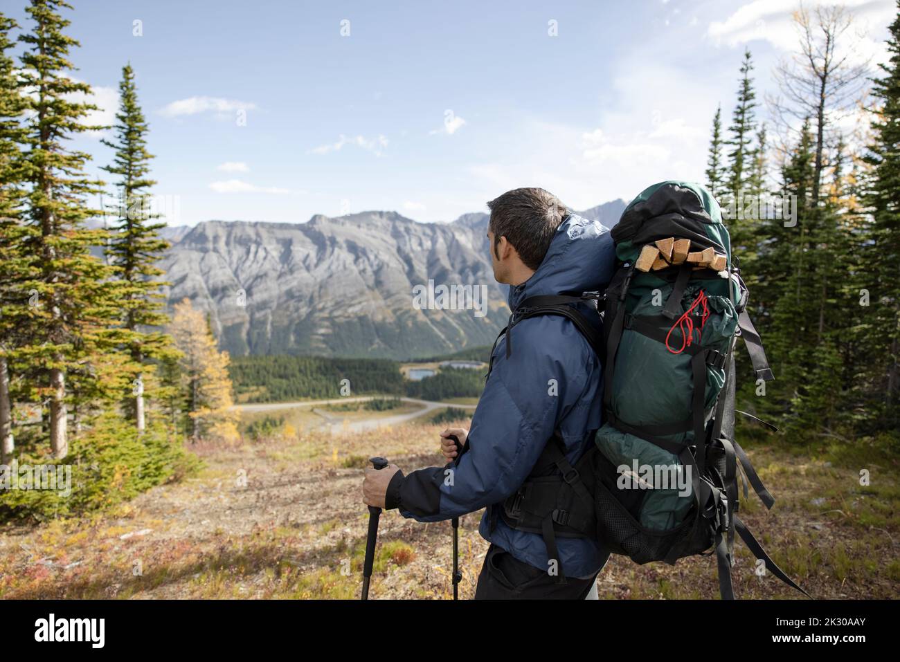 Male backpacker enjoying majestic mountain view, Canadian Rockies Stock ...