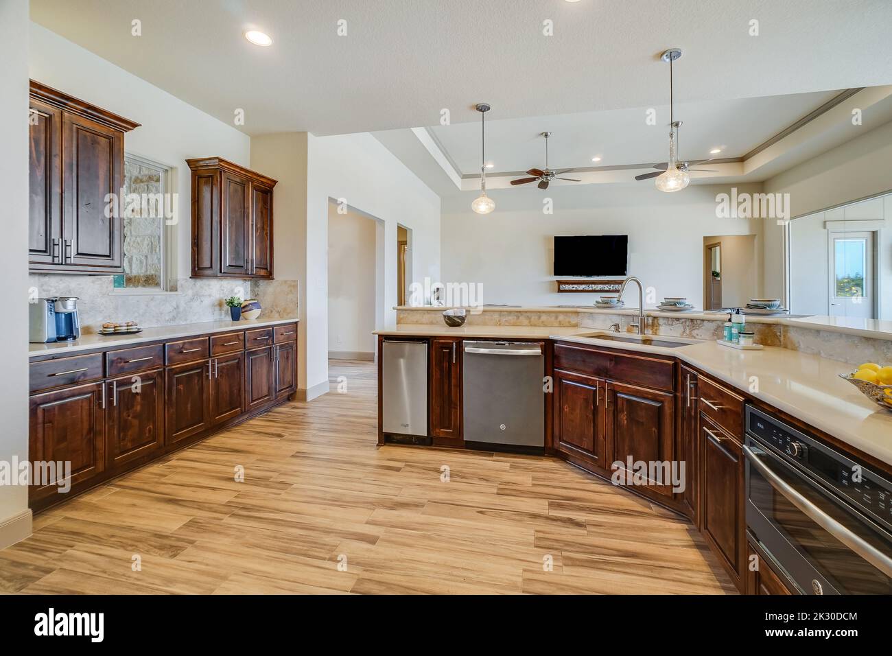 Warm wood kitchen cabinets hi-res stock photography and images - Alamy