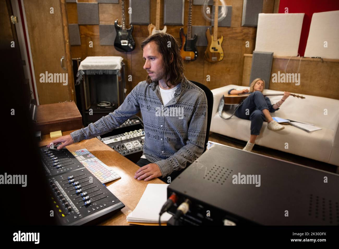 Working in music hi-res stock photography and images - Alamy