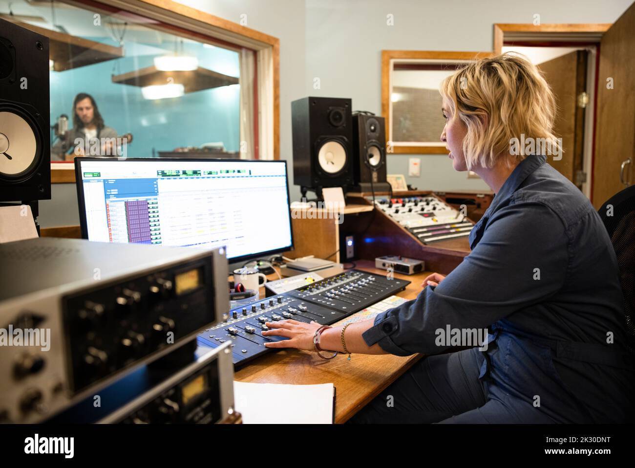 Working in music hi-res stock photography and images - Alamy