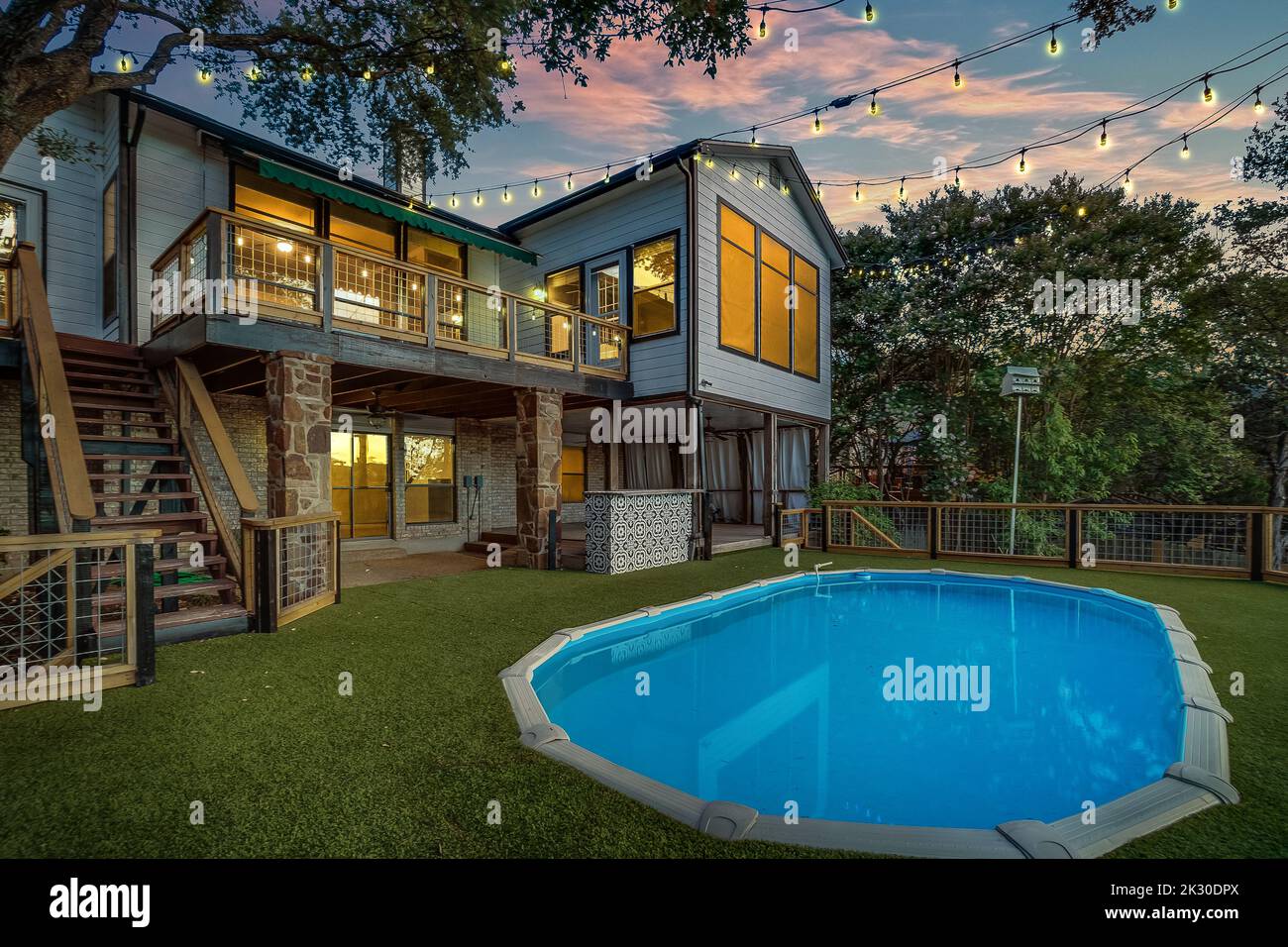 sunset back yard and patio Stock Photo - Alamy