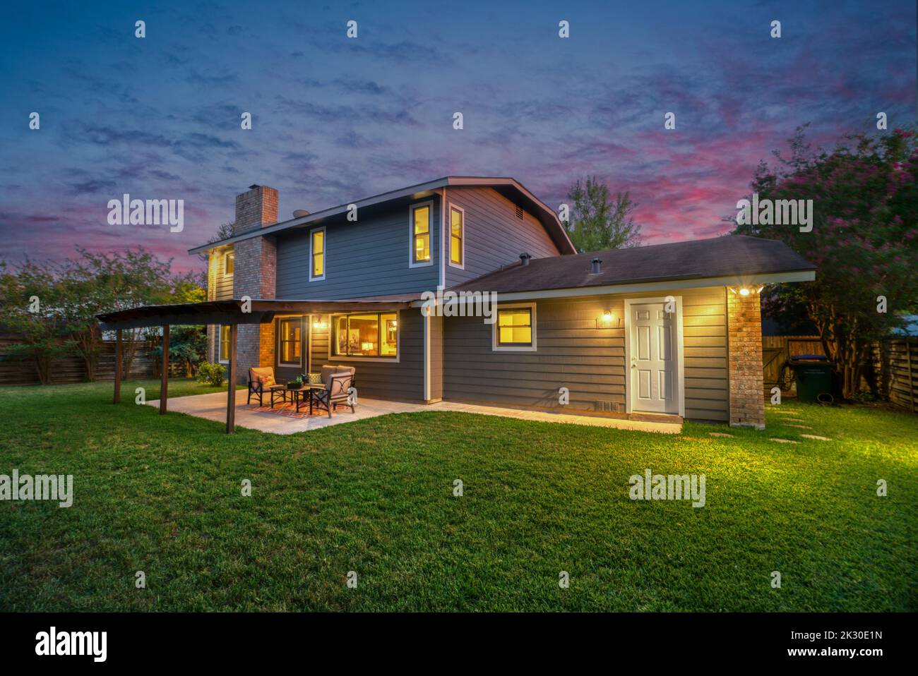 sunset back yard and patio Stock Photo - Alamy
