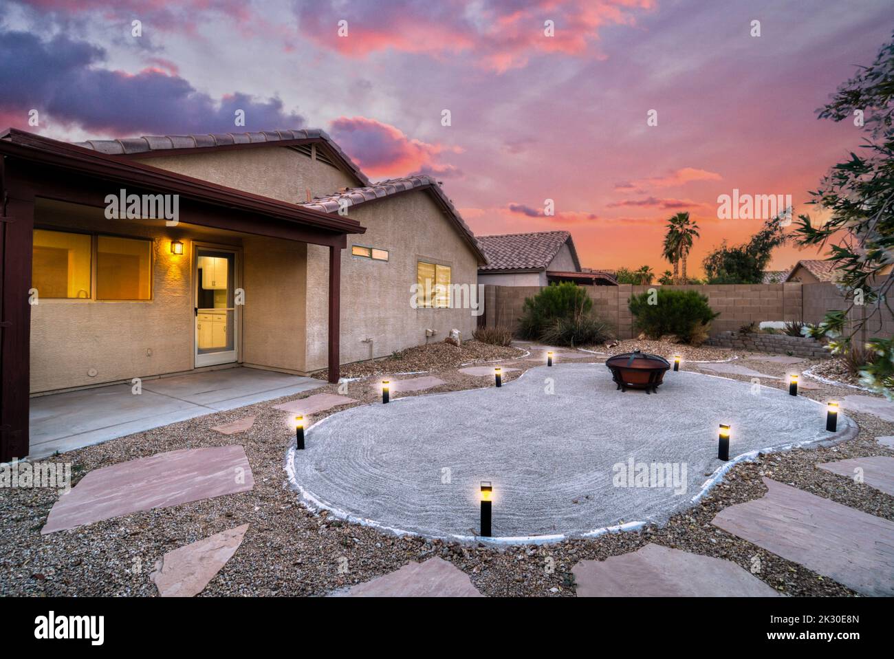 sunset back yard and patio Stock Photo - Alamy