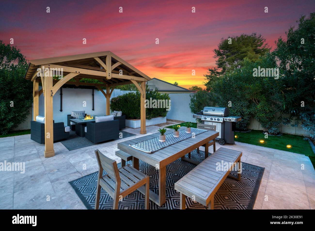 sunset back yard and patio Stock Photo - Alamy