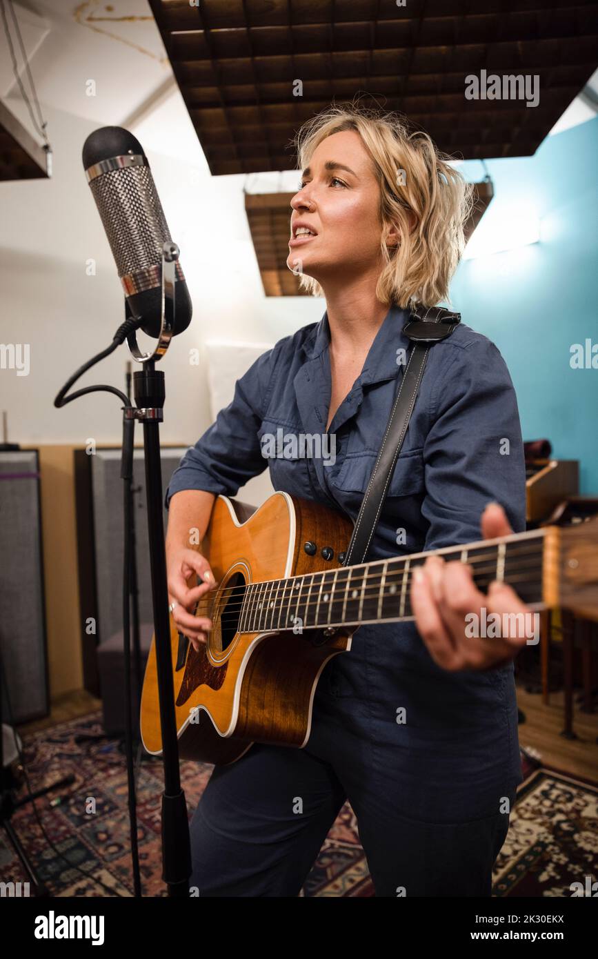 Woman singing in recording studio hi-res stock photography and images ...