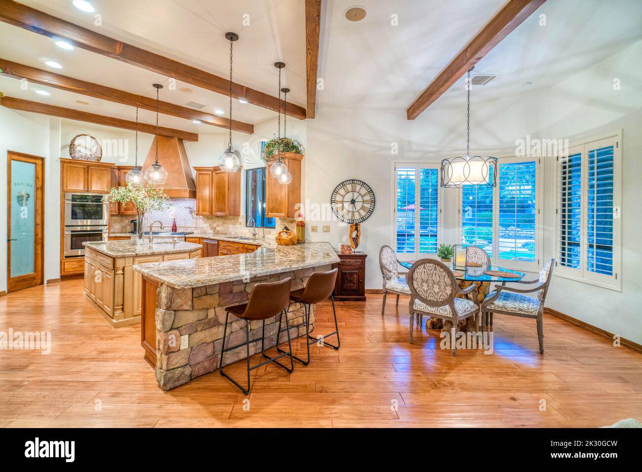 White kitchen with warm wood cabinets hi-res stock photography and ...