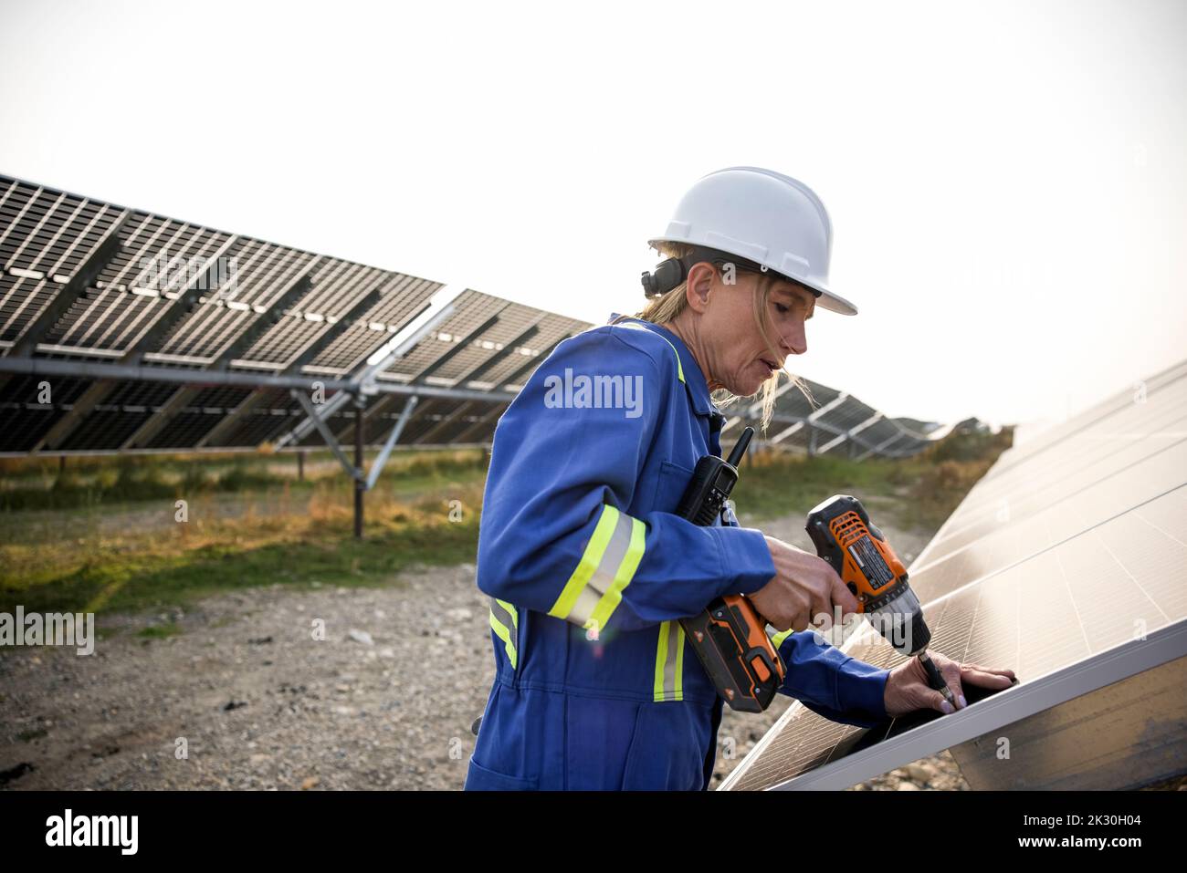 Solar panel maintenance woman hi-res stock photography and images - Alamy