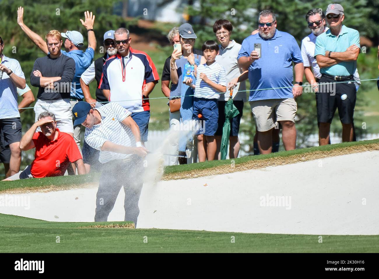 Charlotte, NC, USA. 23rd Sep, 2022. Patrick Cantlay hits out of a fairway bunker during the ...