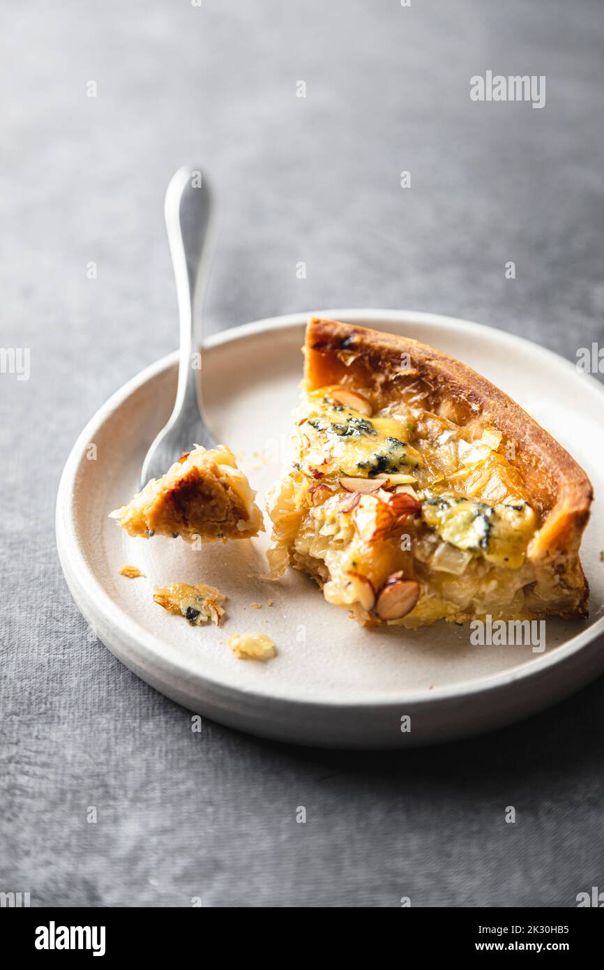 Slice of freshly baked baked almond pie Stock Photo - Alamy
