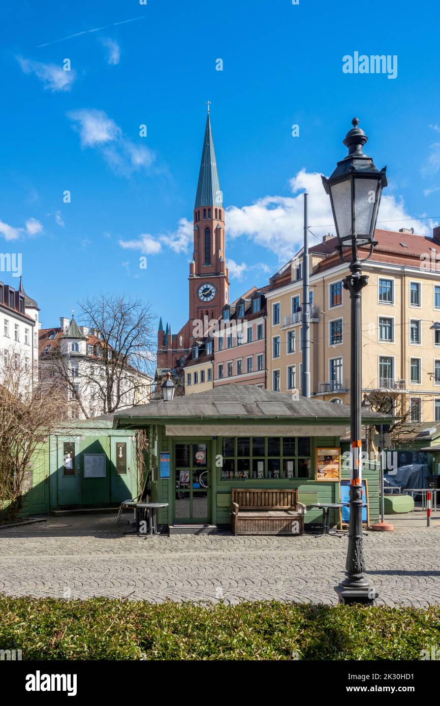 Germany, Bavaria, Munich, Wiener Platz in summer with kiosk in ...