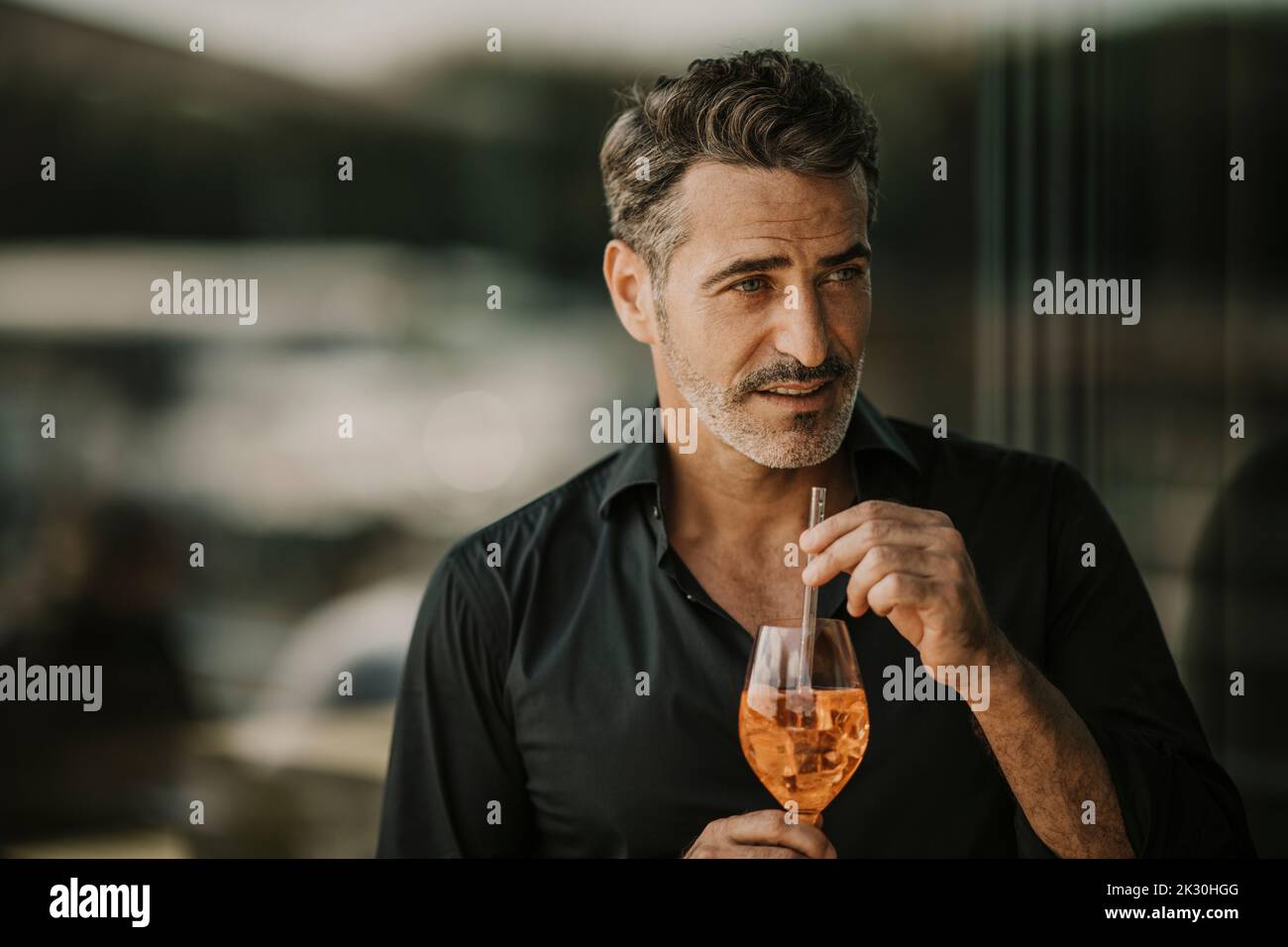 Holding glass drinking drink hi-res stock photography and images - Alamy