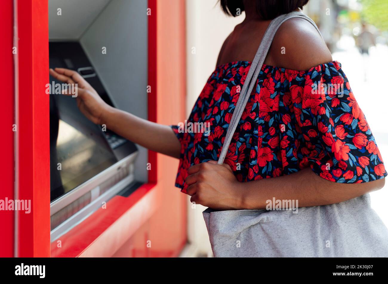 Person using atm hi-res stock photography and images - Alamy