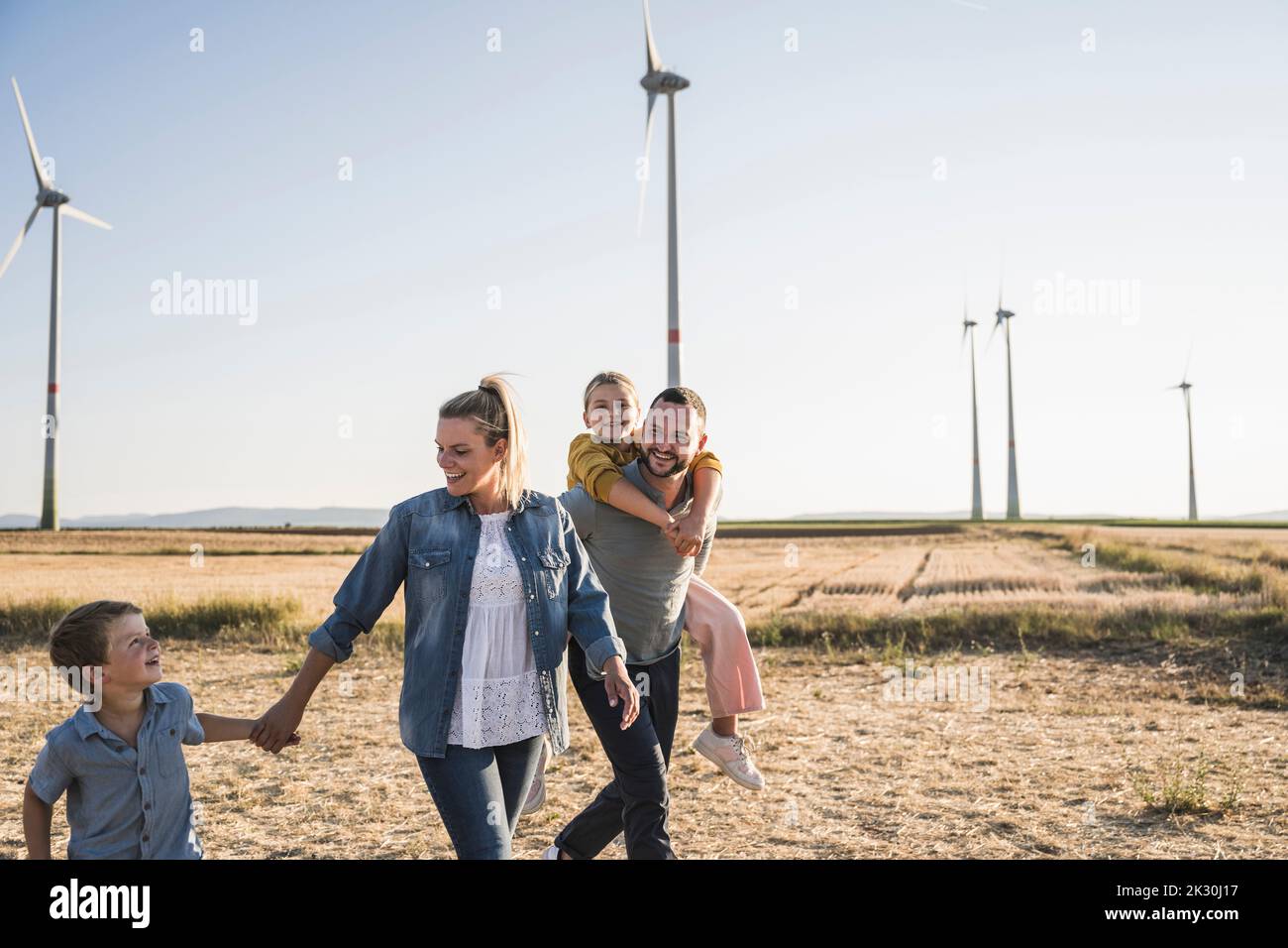 Confident father carrying son hi-res stock photography and images - Alamy