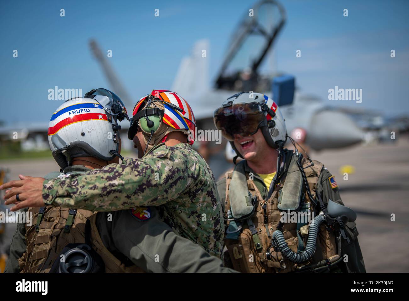 U.S. Navy officers assigned to the Strike Fighter Squadron (VFA) 2 ...