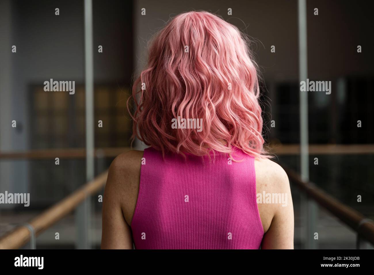 Young woman with pink dyed hair Stock Photo - Alamy