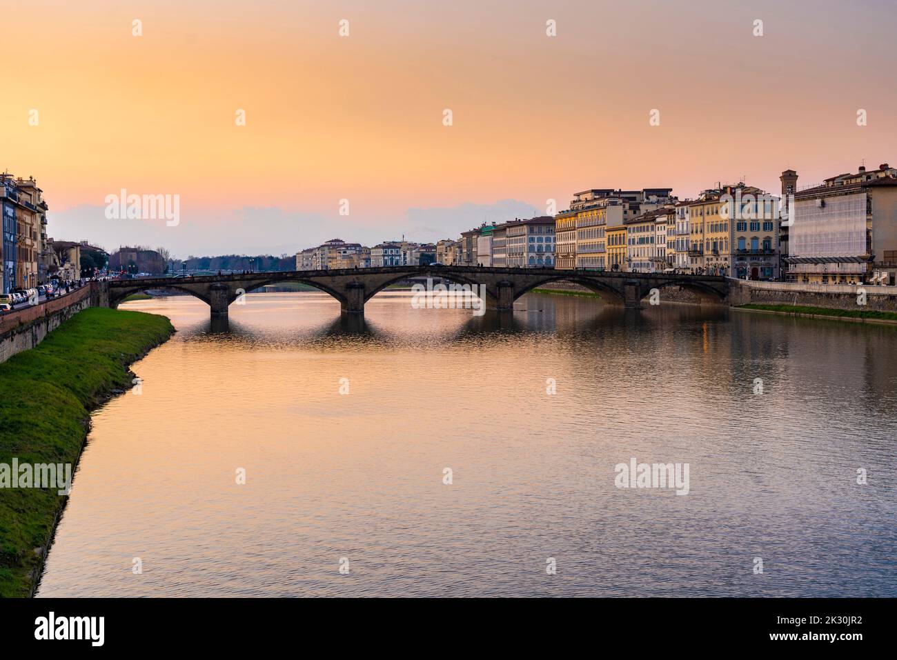Italy, Tuscany, Florence, Arno River and Holy Trinity Bridge at dusk ...