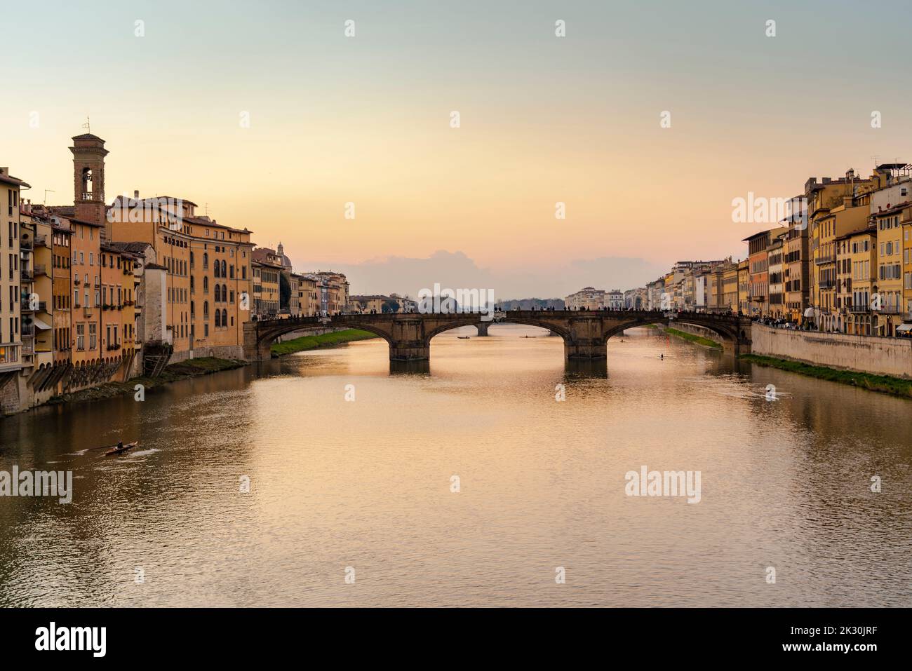 Italy, Tuscany, Florence, Arno River and Holy Trinity Bridge at dusk ...