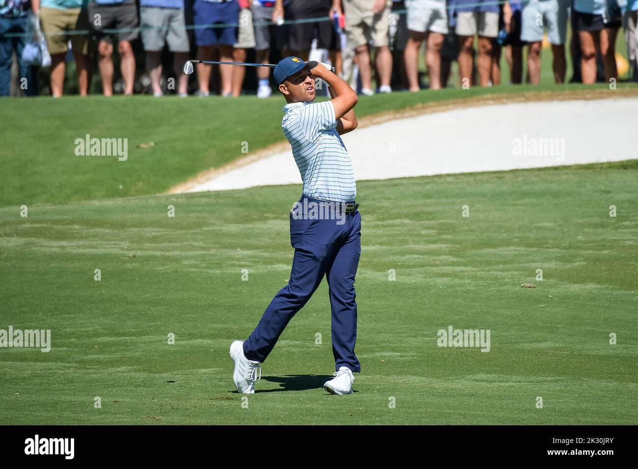 Charlotte, NC, USA. 23rd Sep, 2022. Xander Schauffele hits a shot on the 5th hole during the ...