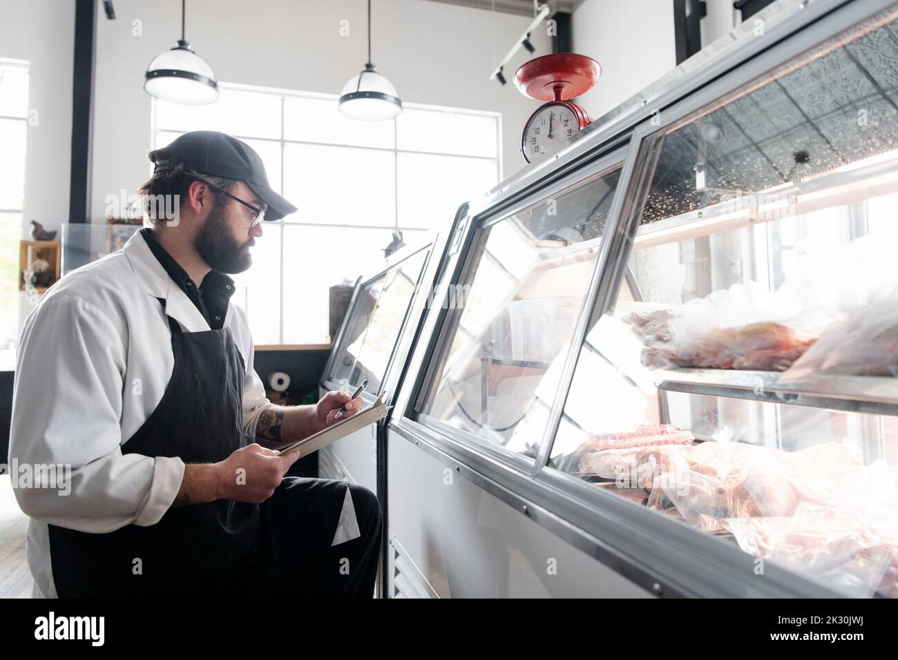 Checking the meat hi-res stock photography and images - Alamy