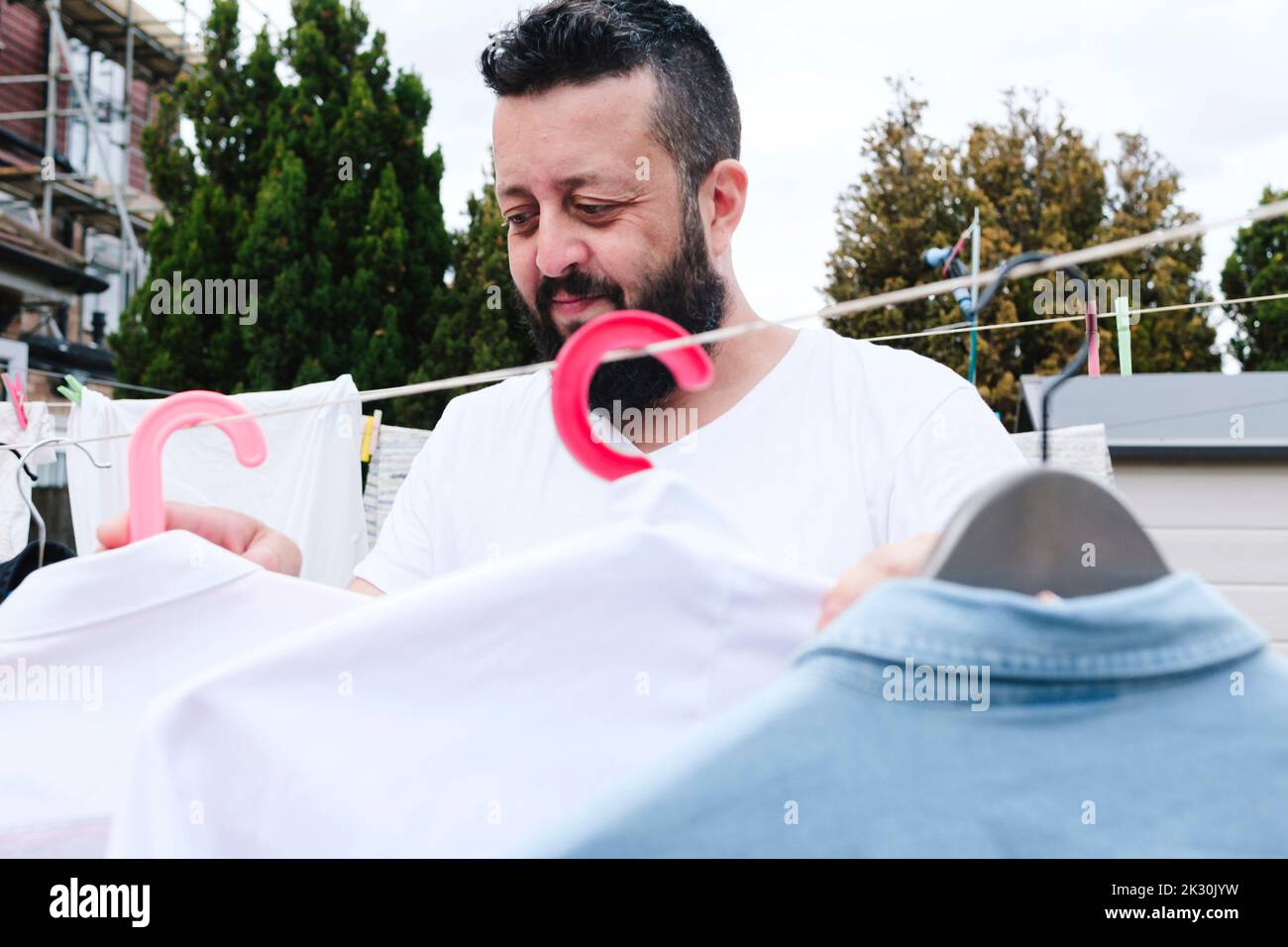 Clothes hanging on clothesline in hi-res stock photography and images ...