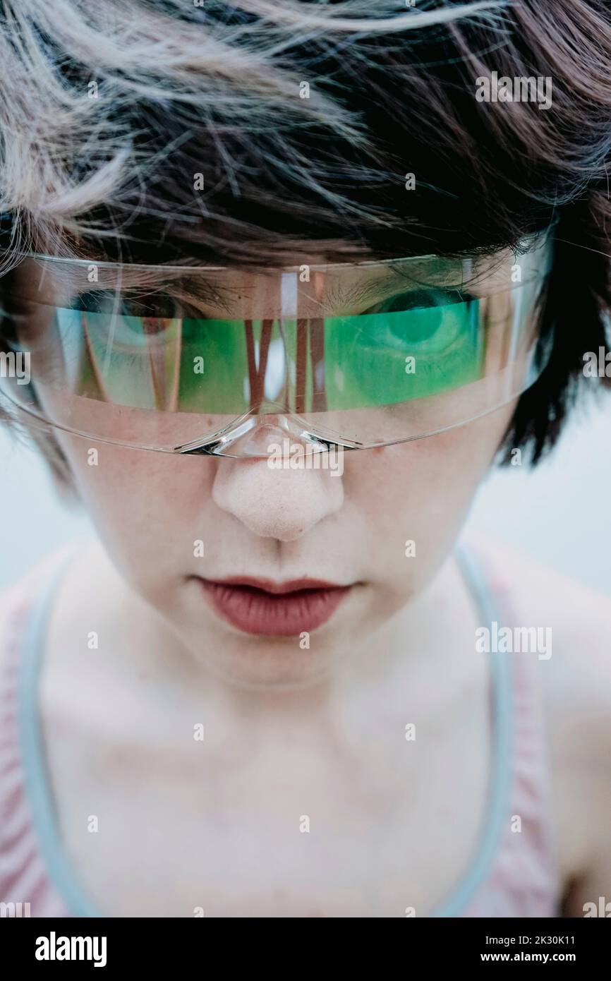 Androgynous woman with short hair wearing futuristic glasses Stock ...