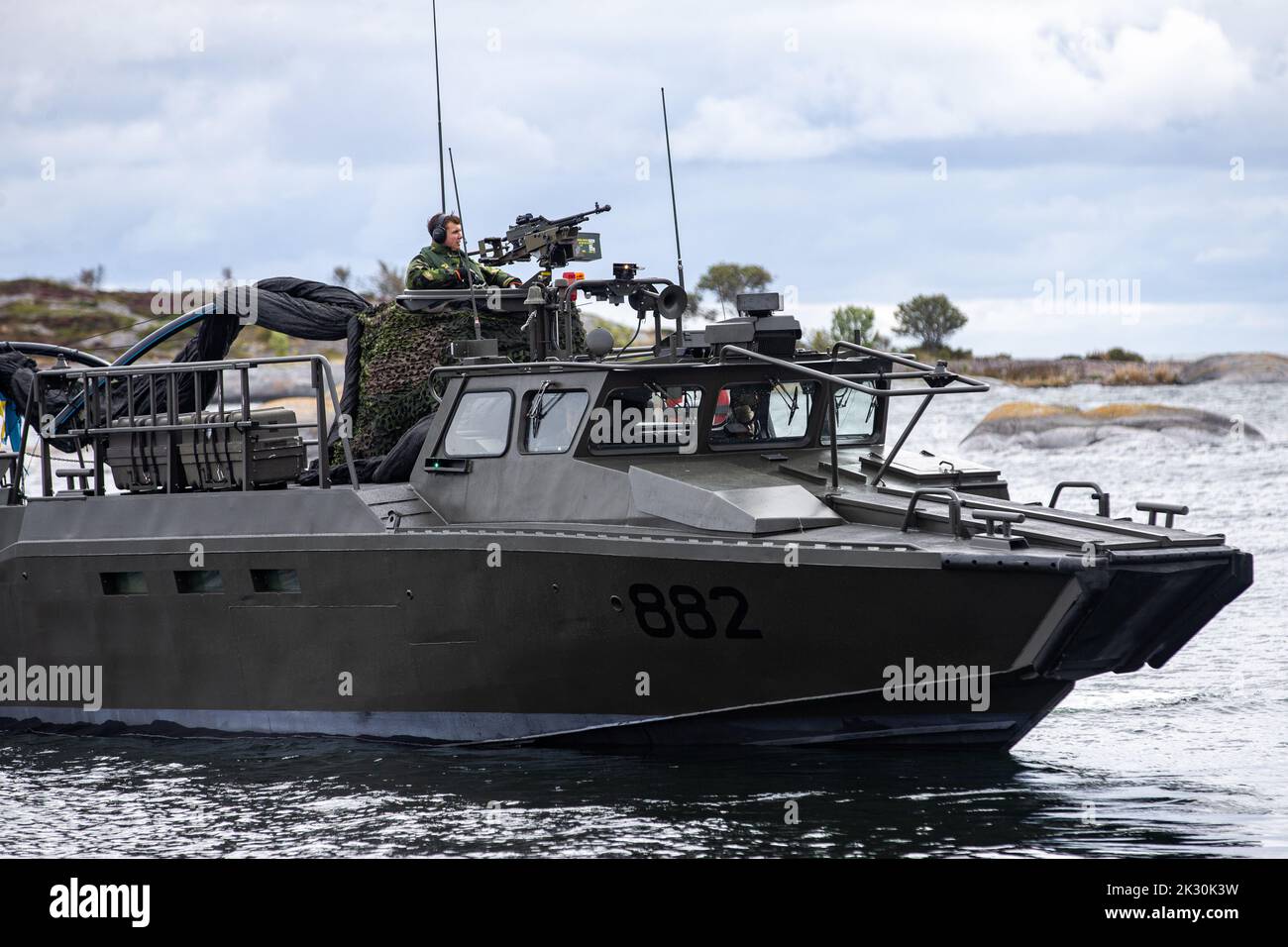 Swedish Marines drive U.S. Marines in a Swedish combat boat 90 while ...
