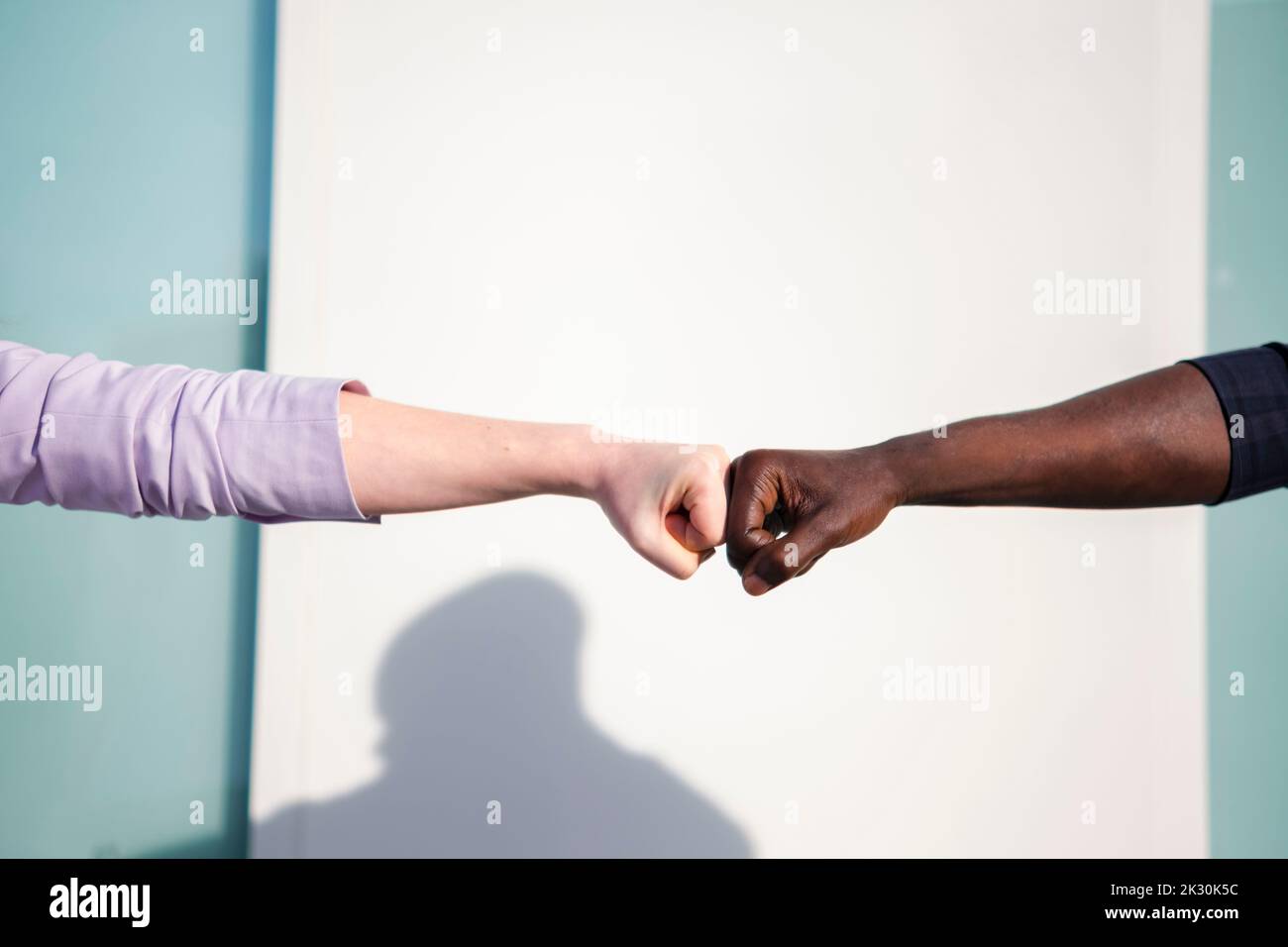 People bump each other hi-res stock photography and images - Alamy