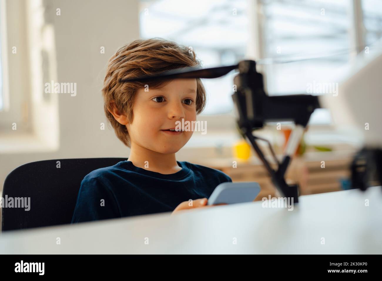 Male operating remote control hi-res stock photography and images - Alamy