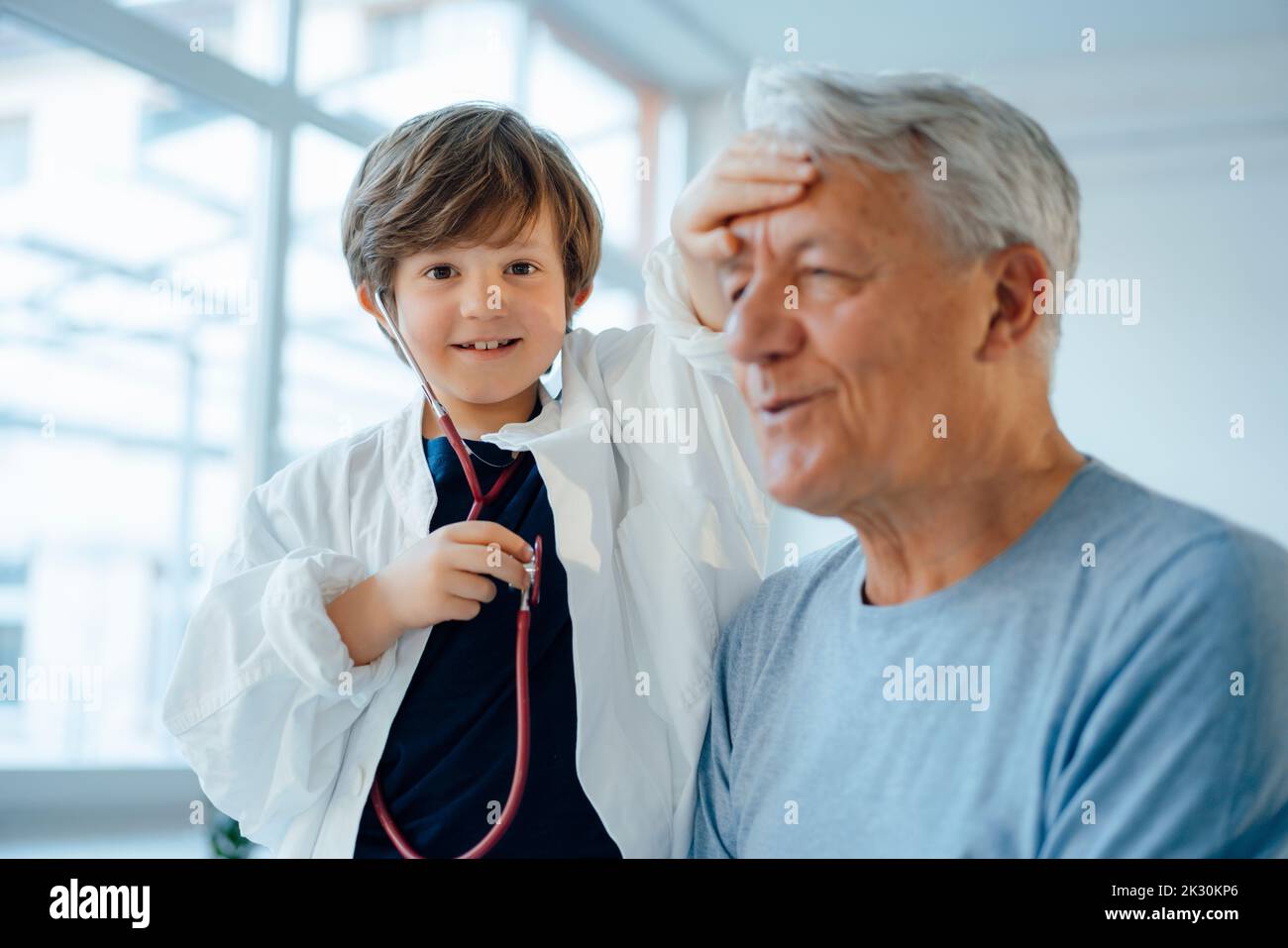 Doctor checking temperature hi-res stock photography and images - Alamy